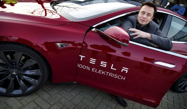 Tesla unveils its bizarre new 'Snakebot' automatic car charger | The ...