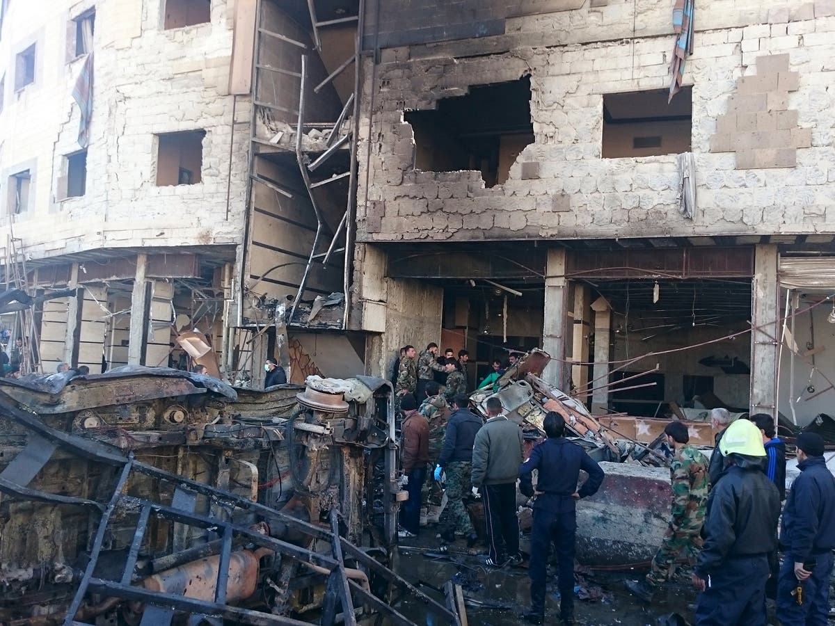 Isis kills at least 60 people in triple suicide bomb attack near ...