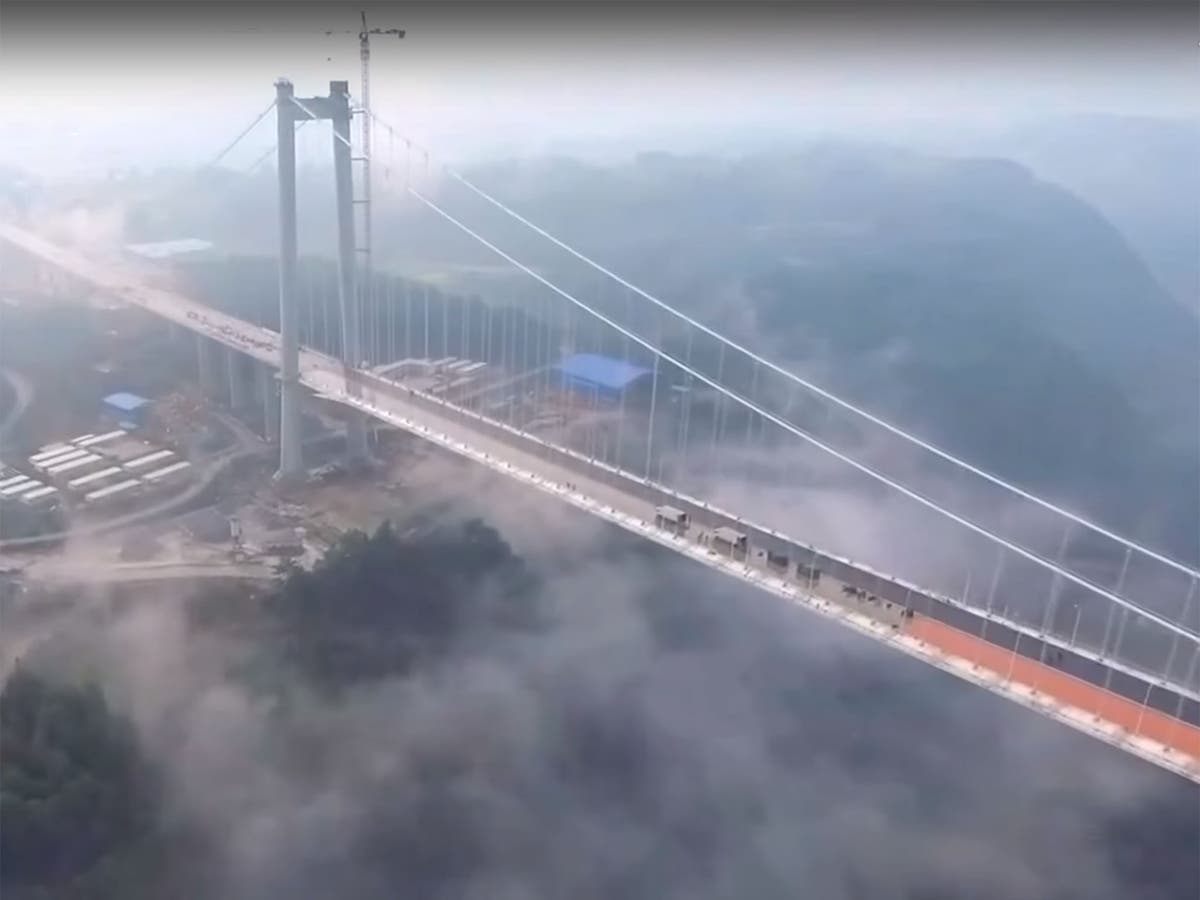 Drone footage shows the longest and tallest suspension bridge in China ...