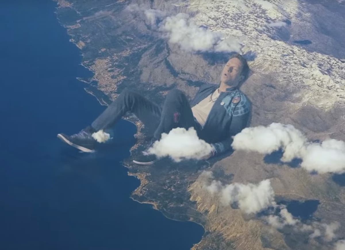 Coldplay: New video for 'Up&Up' sees Chris Martin become a musical ...