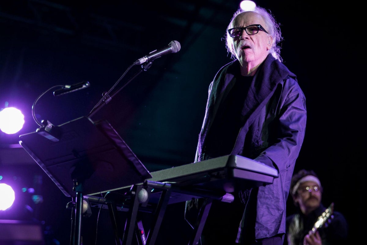 Cult horror film director John Carpenter goes from behind the camera to ...