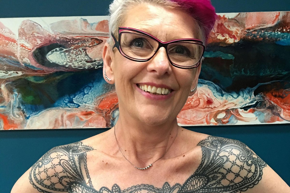 'I've regained control over my body': Woman gets chest tattoo to cover ...