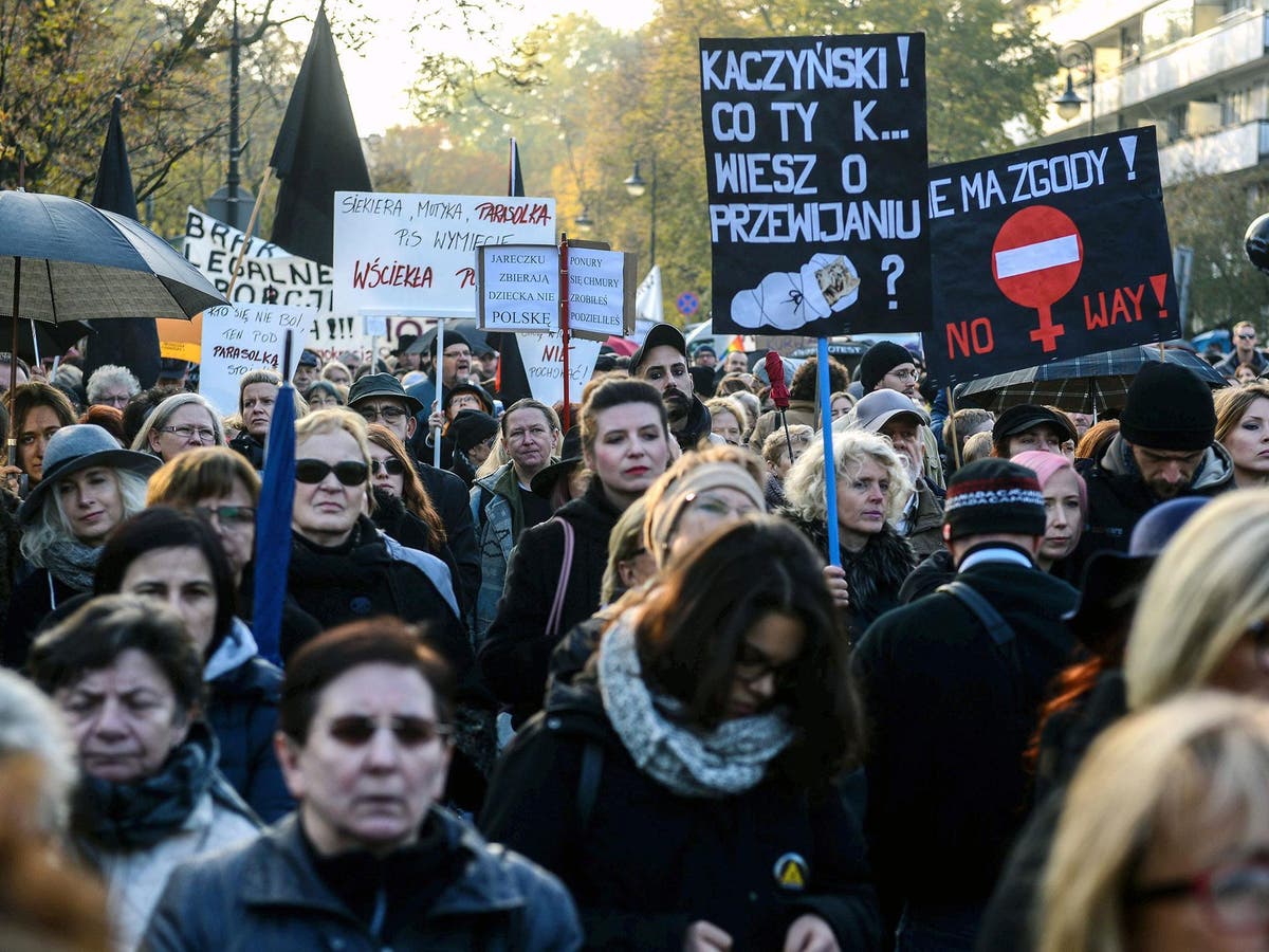 Polish abortion protests: Women dress in black and take to streets to ...