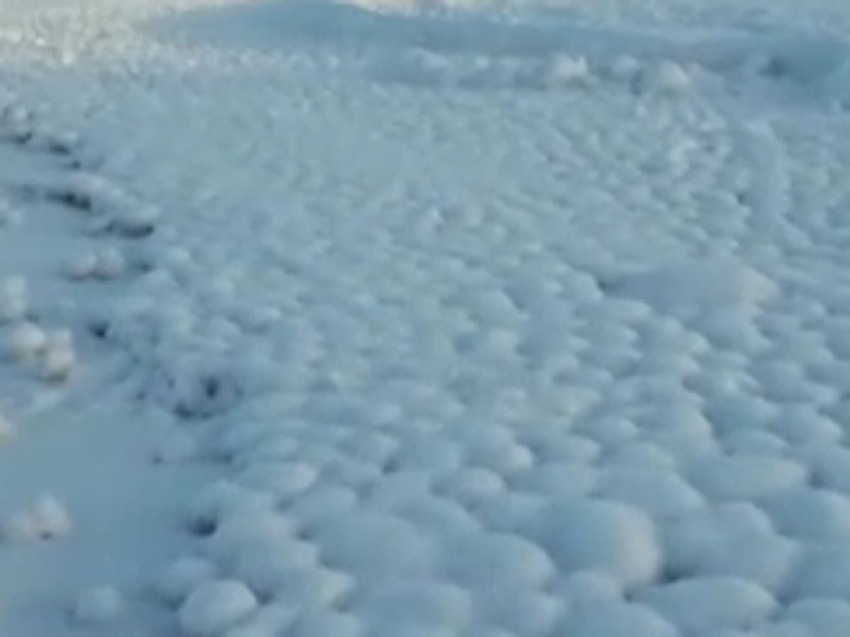 Thousands of massive snowballs form on Russian beach | The Independent ...