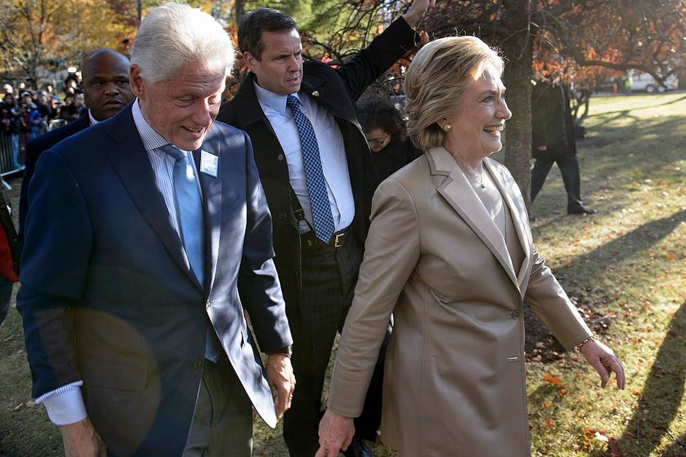 Bill Clinton dazzled in a revealing blue suit as he cast his vote for ...