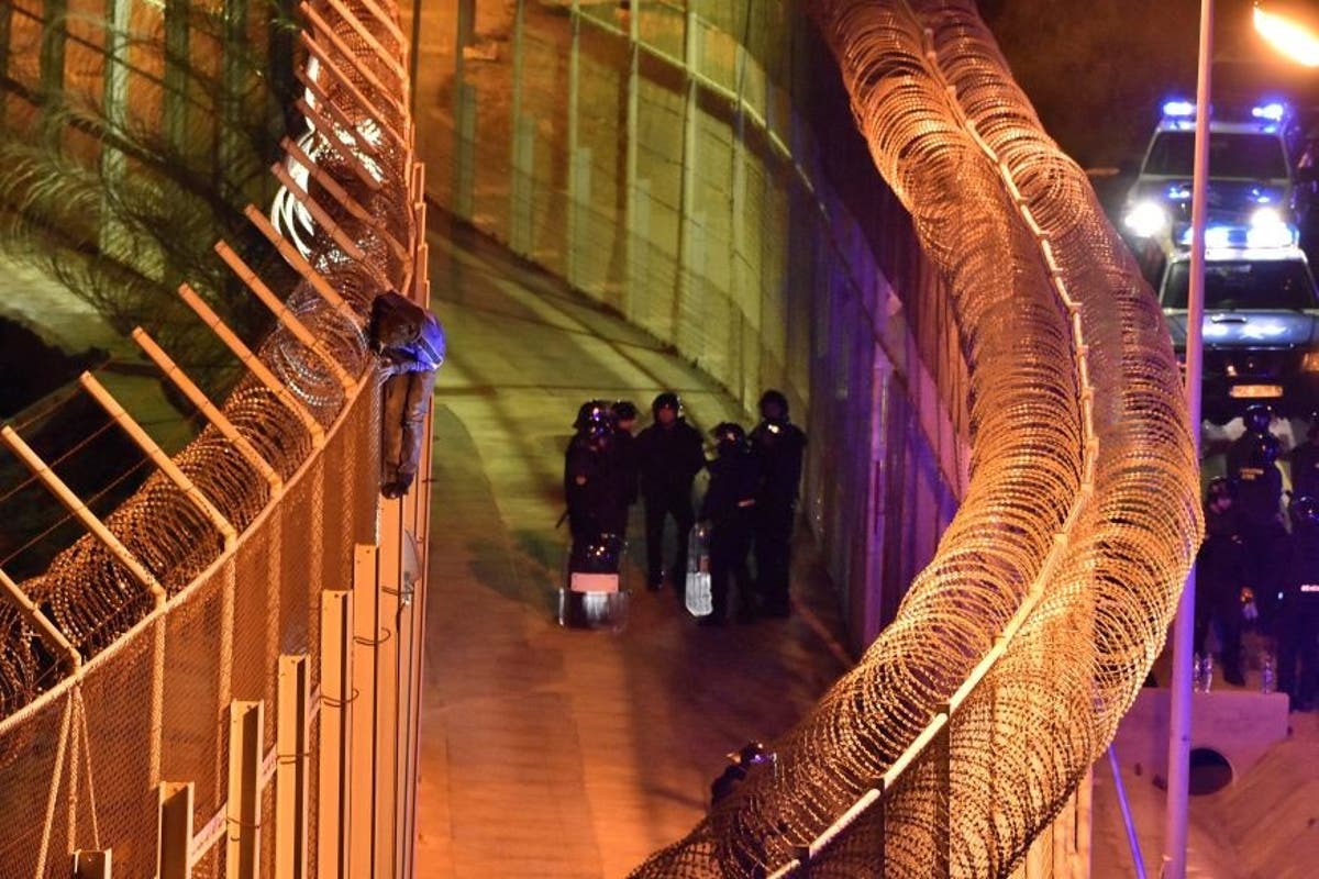 More than 1,000 migrants storm border at Spain's Ceuta enclave | The ...