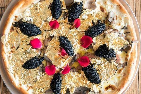 This restaurant is serving 24K gold pizza for $2000 because why not ...