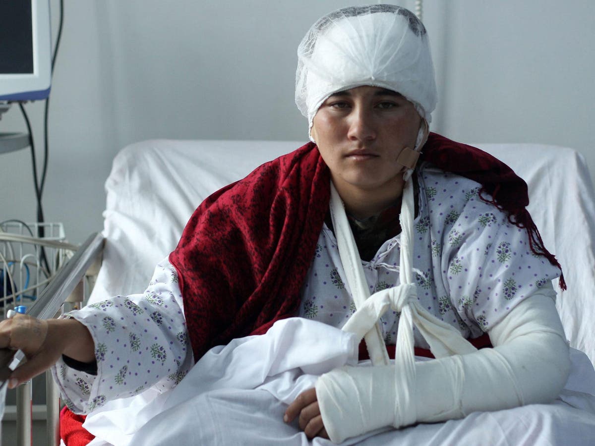 Afghan woman has ears cut off by 'suspicious' husband in middle of the ...