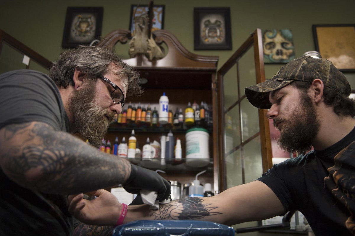 'Sometimes people change': US shop covers racist tattoos for free | The ...