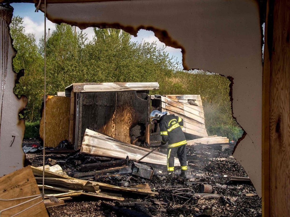 Hundreds of refugees unaccounted for after fire destroys Dunkirk camp ...