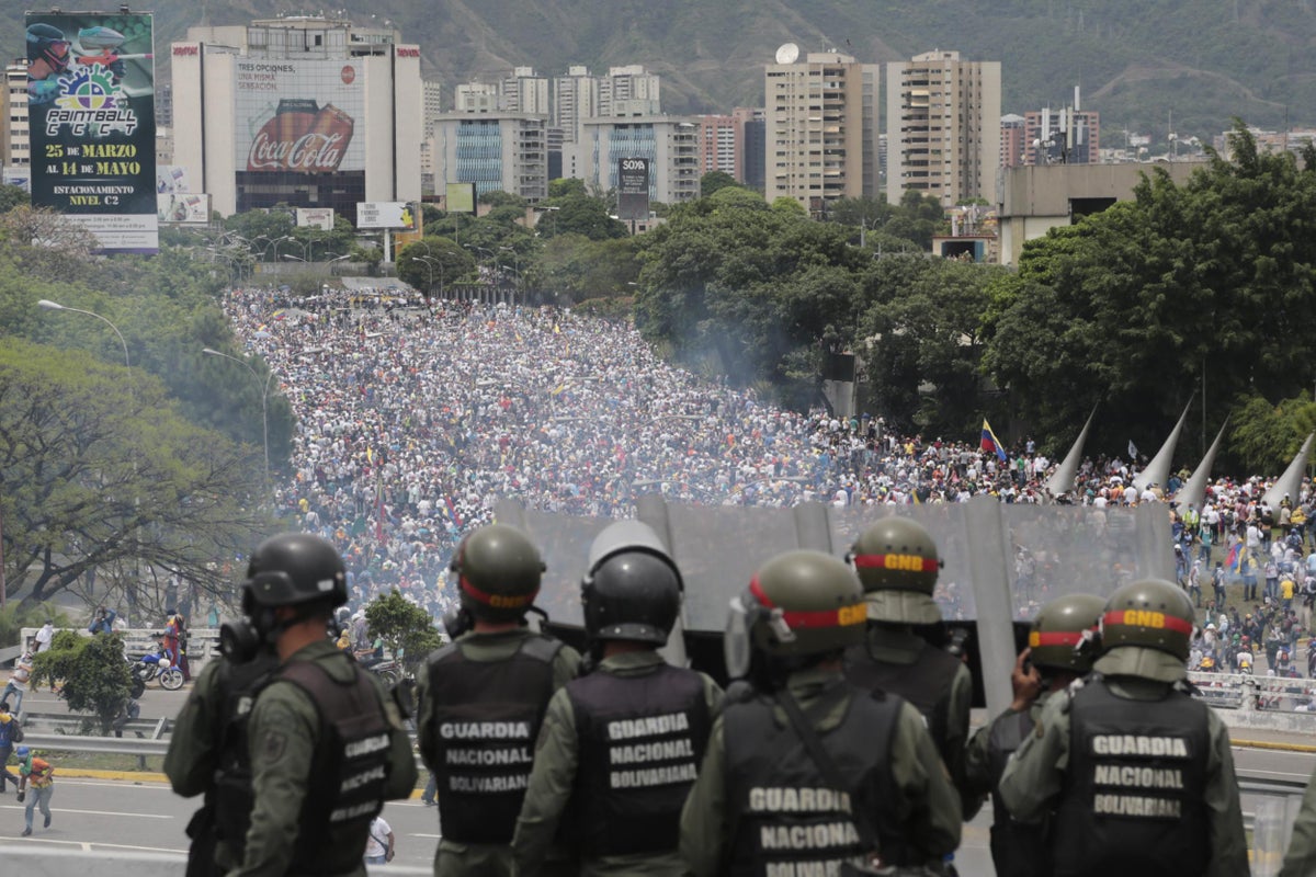 Hugo Chavez statue torn down in deadly Venezuela protest | The ...