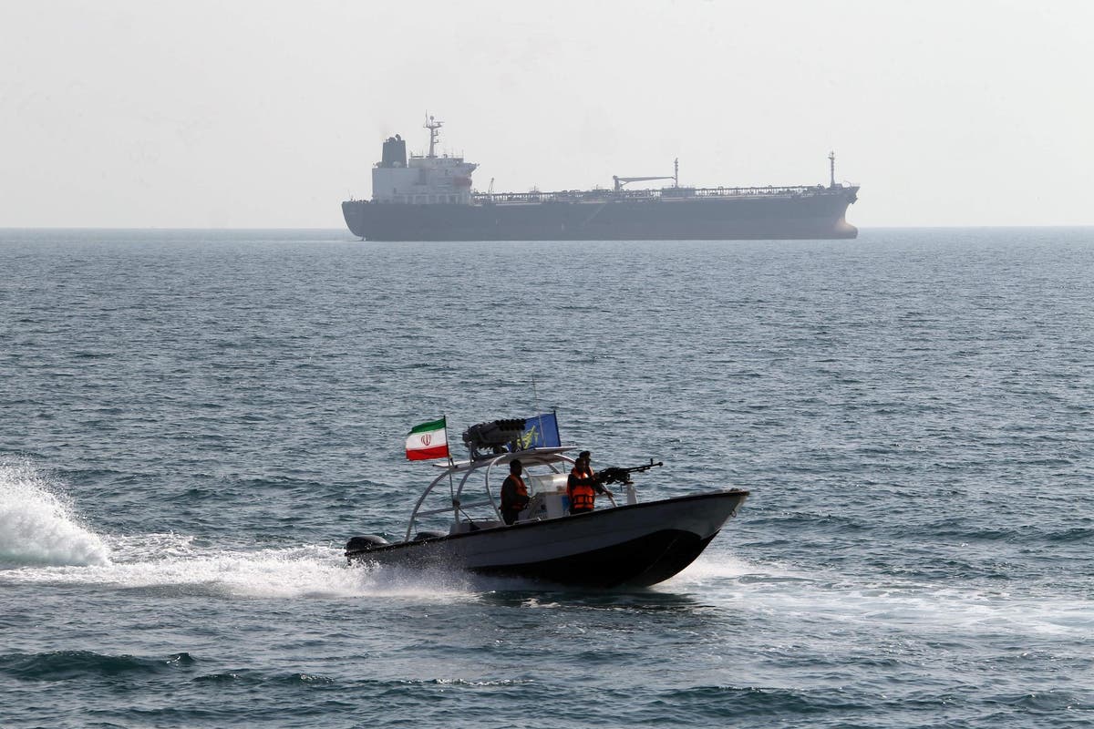 Iranian military vessel 'confronts US warship in the Gulf' as tensions ...