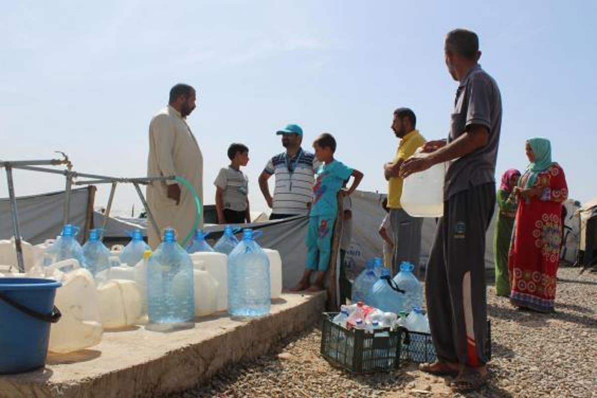 Iraqi government employees given day off work as summer temperatures ...