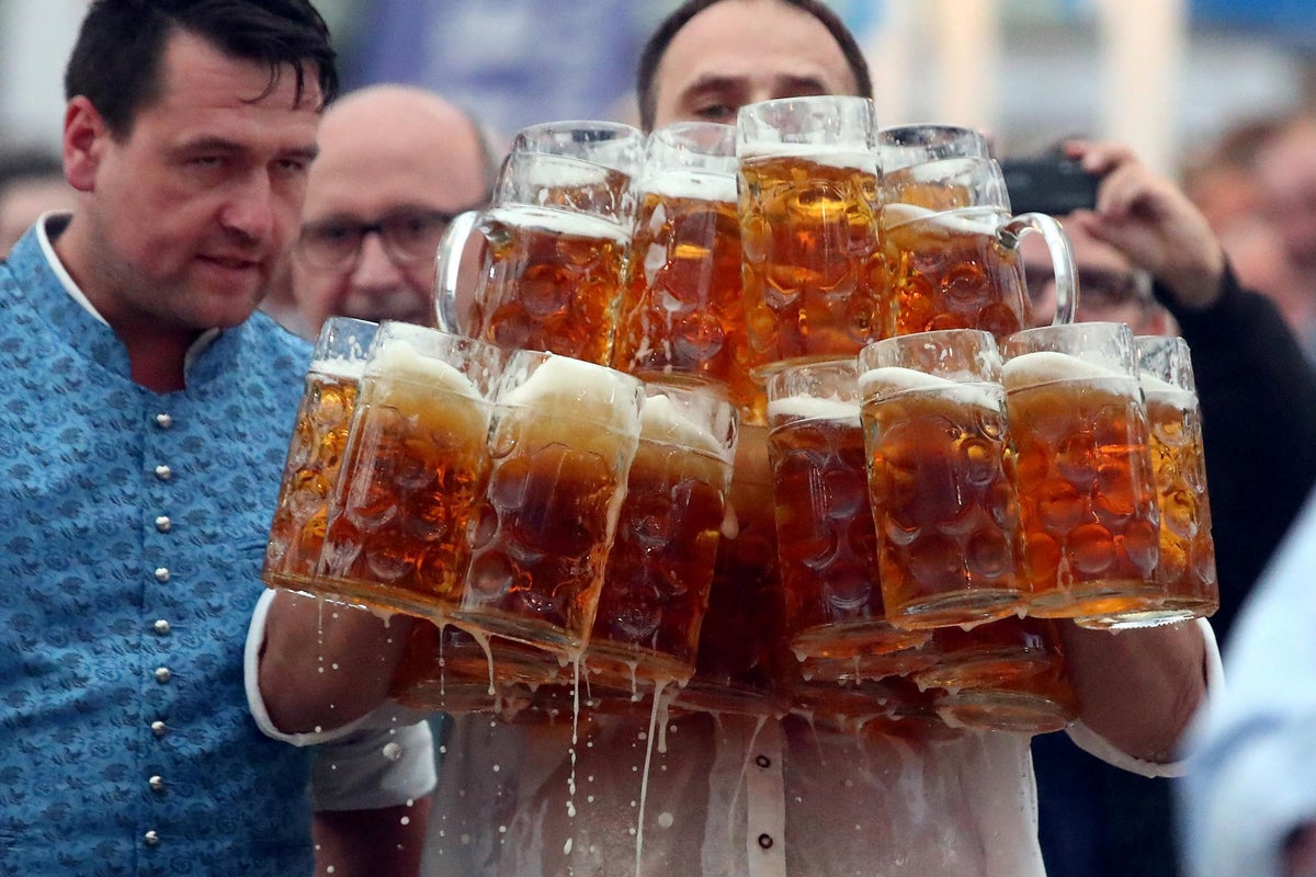 German tax inspector breaks world record for carrying beer | The ...
