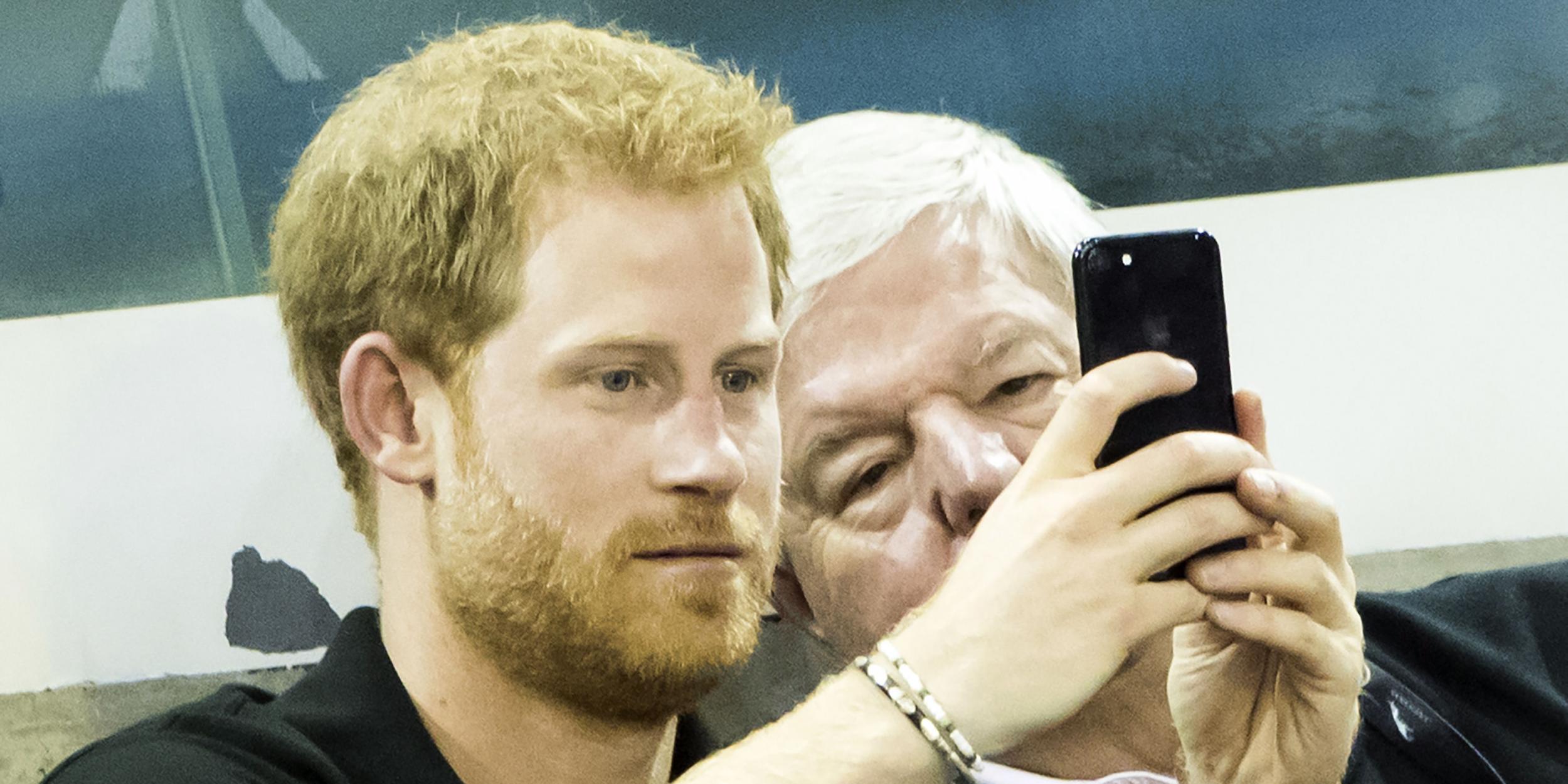 Prince Harry urges young people to look up from their phones. Is ...
