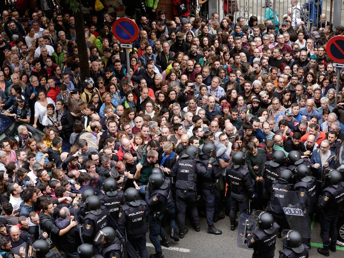 Hundreds injured as Spanish riot police try to stop referendum voters ...
