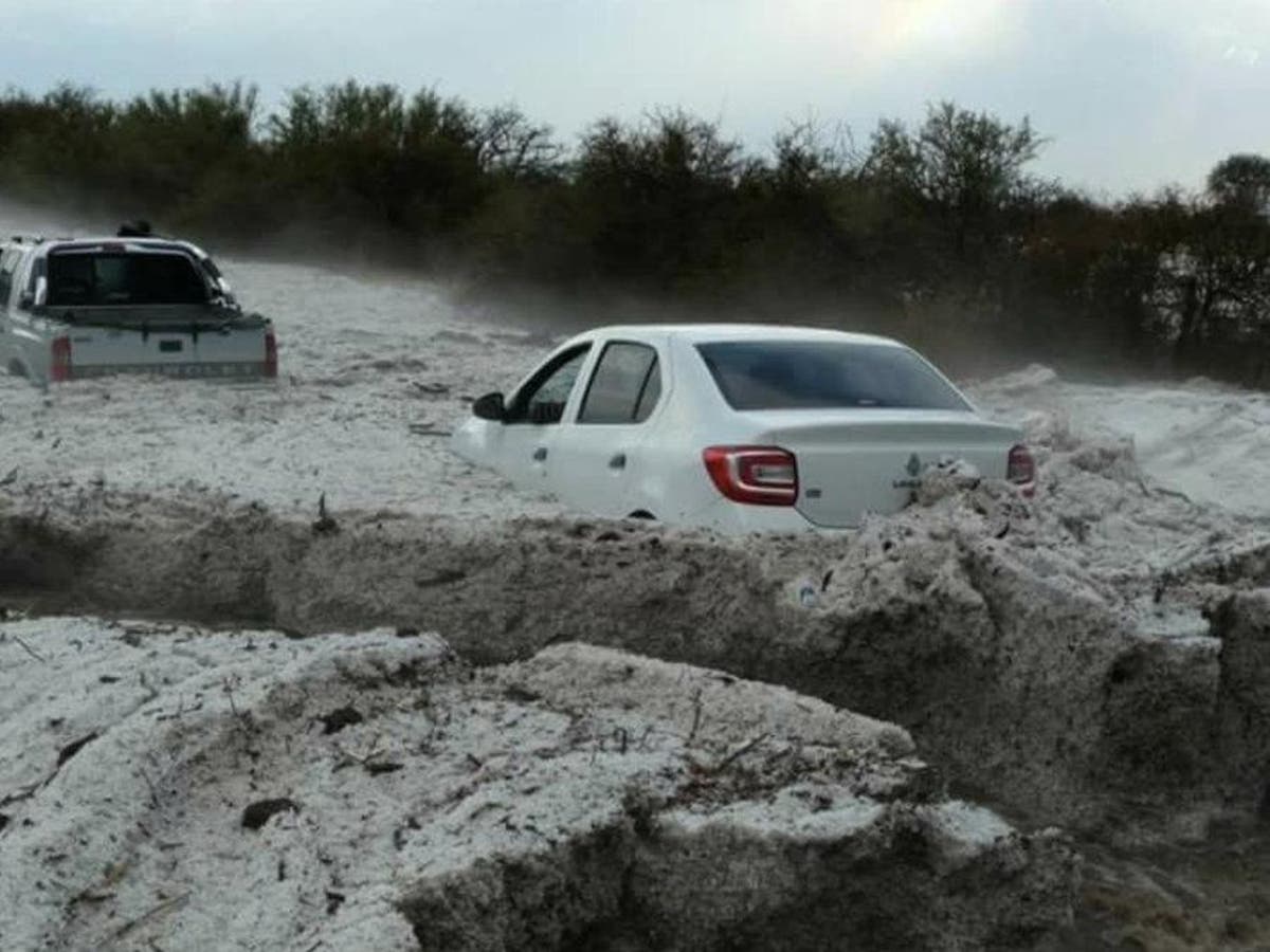 Apocalyptic photos show sea of hail swamping cars in Argentina | The ...