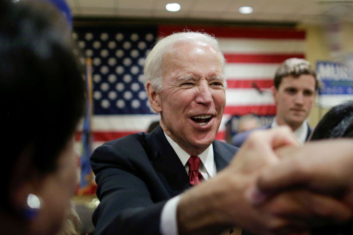 Photograph of Joe Biden talking with homeless man in Washington DC goes ...