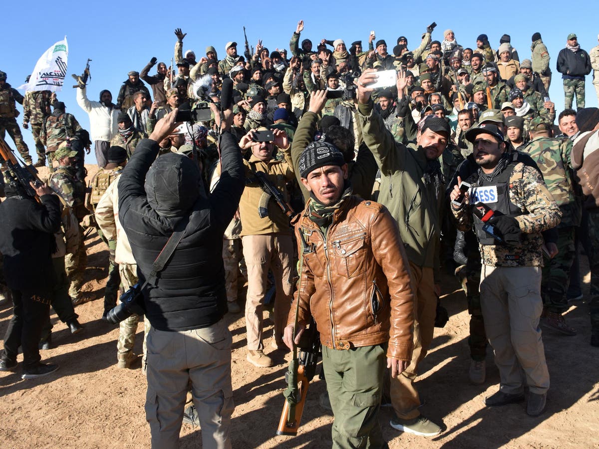 Theresa May warns Isis is 'not yet defeated' after Iraq declares ...