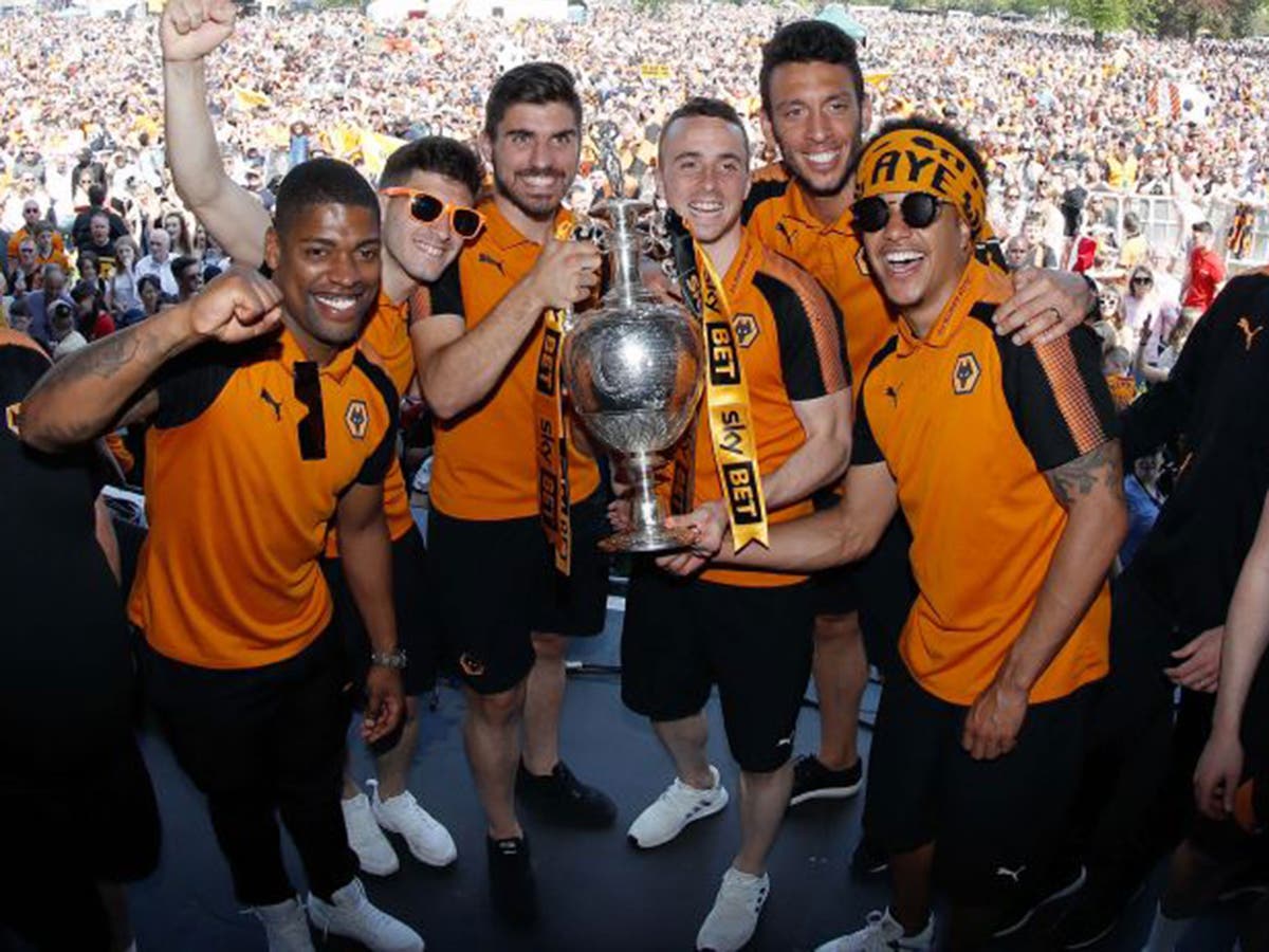 Wolves bask in promotion glory as Ruben Neves vows to stay on for ...