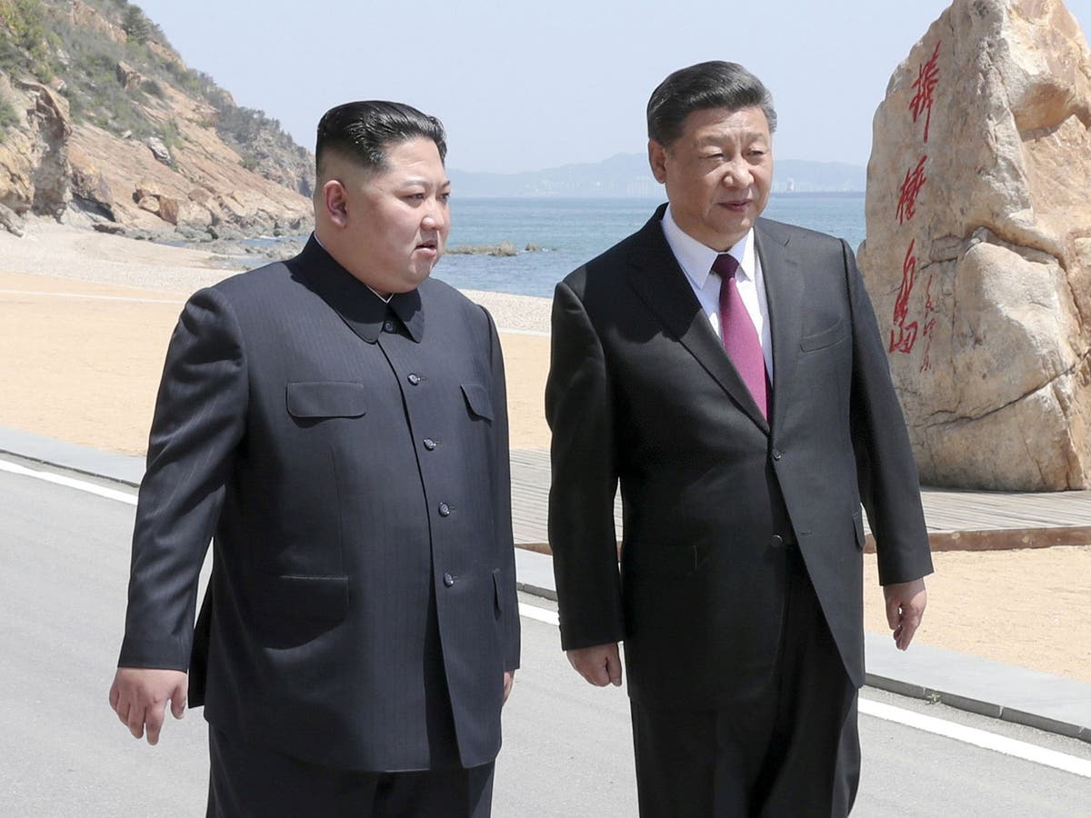 Kim Jong-un travels to China in secretive visit for talks with Xi ...