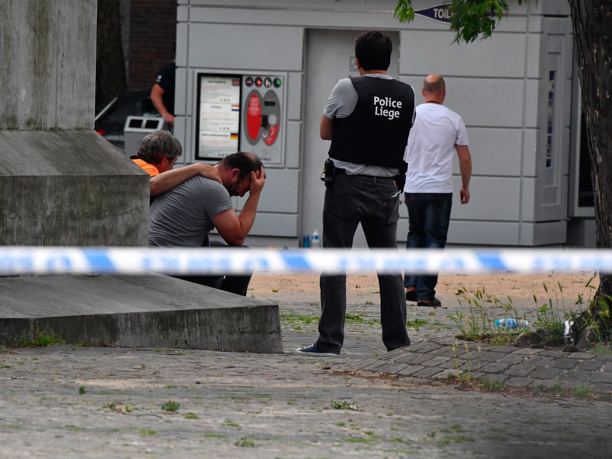 Belgium shooting: Attacker stabs two police officers and steals their ...