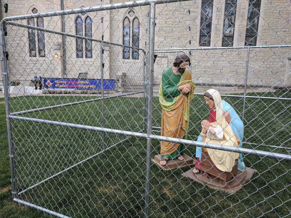 Church puts Mary, Joseph and baby Jesus inside metal cage to protest ...