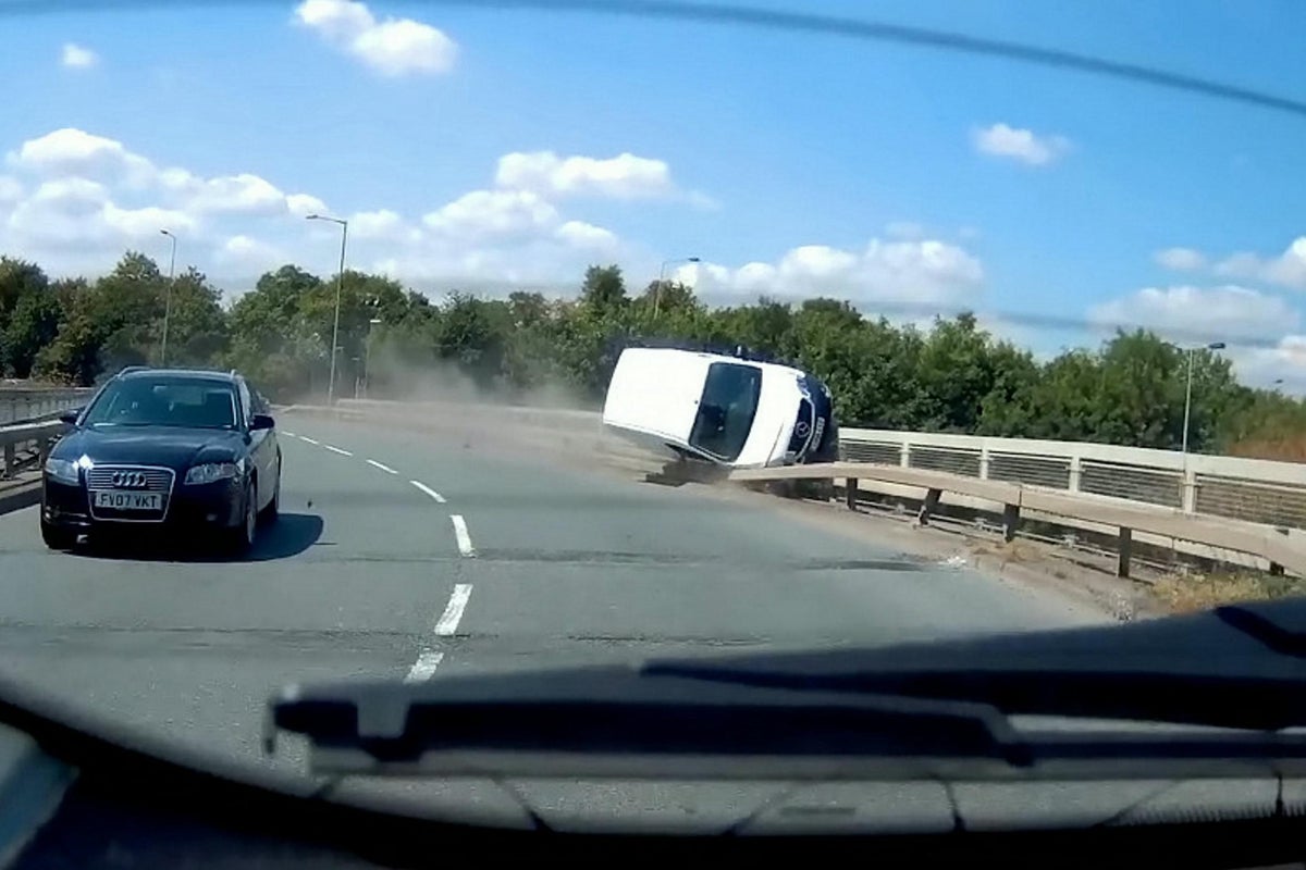 Driving instructor captures footage of van grinding along edge of road ...