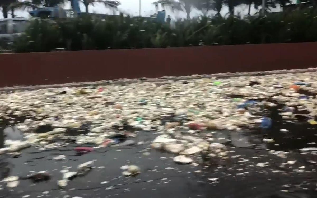 Waves of rubbish crash into Manila after monsoon washes city garbage ...