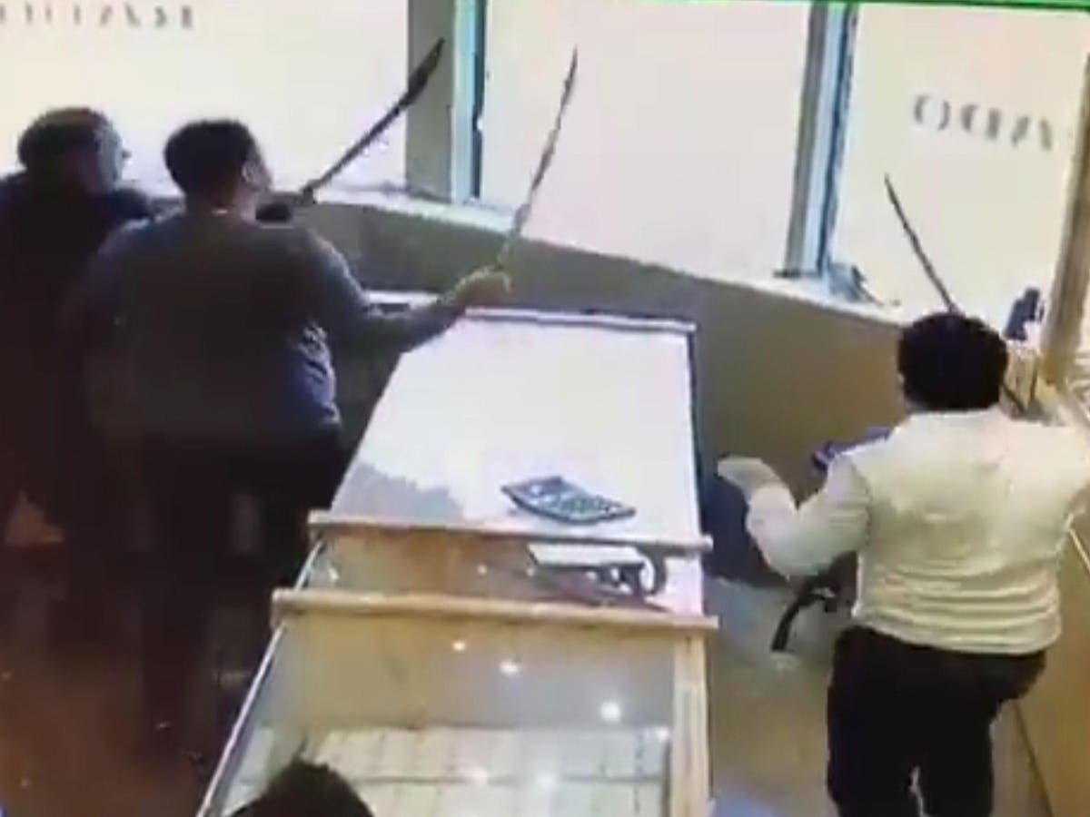 Jewellery store staff use swords to fight off would-be thieves in CCTV ...