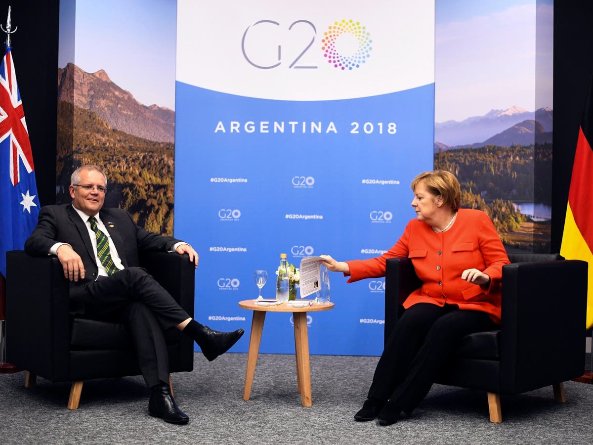 Merkel busted checking 'cheat sheet' with photo of Australian PM at G20 ...
