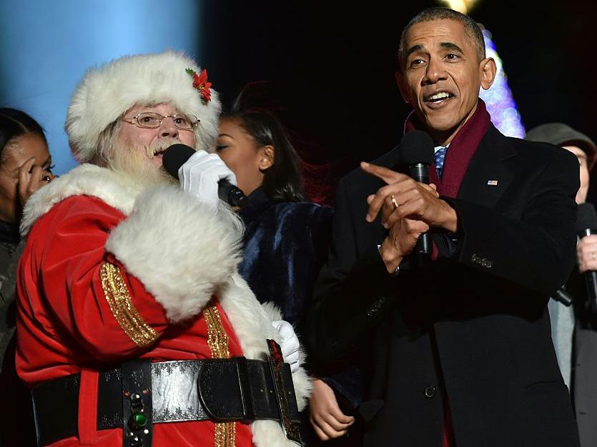Barack Obama dressed as Santa Claus surprises sick children in hospital ...