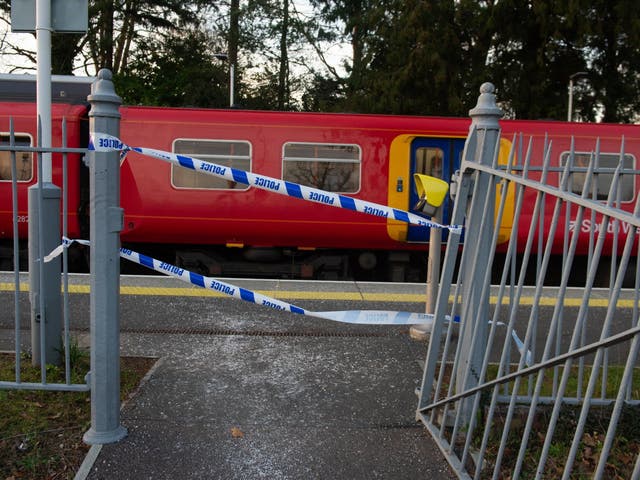Three men hospitalised with knife injuries after fight at Surrey train ...