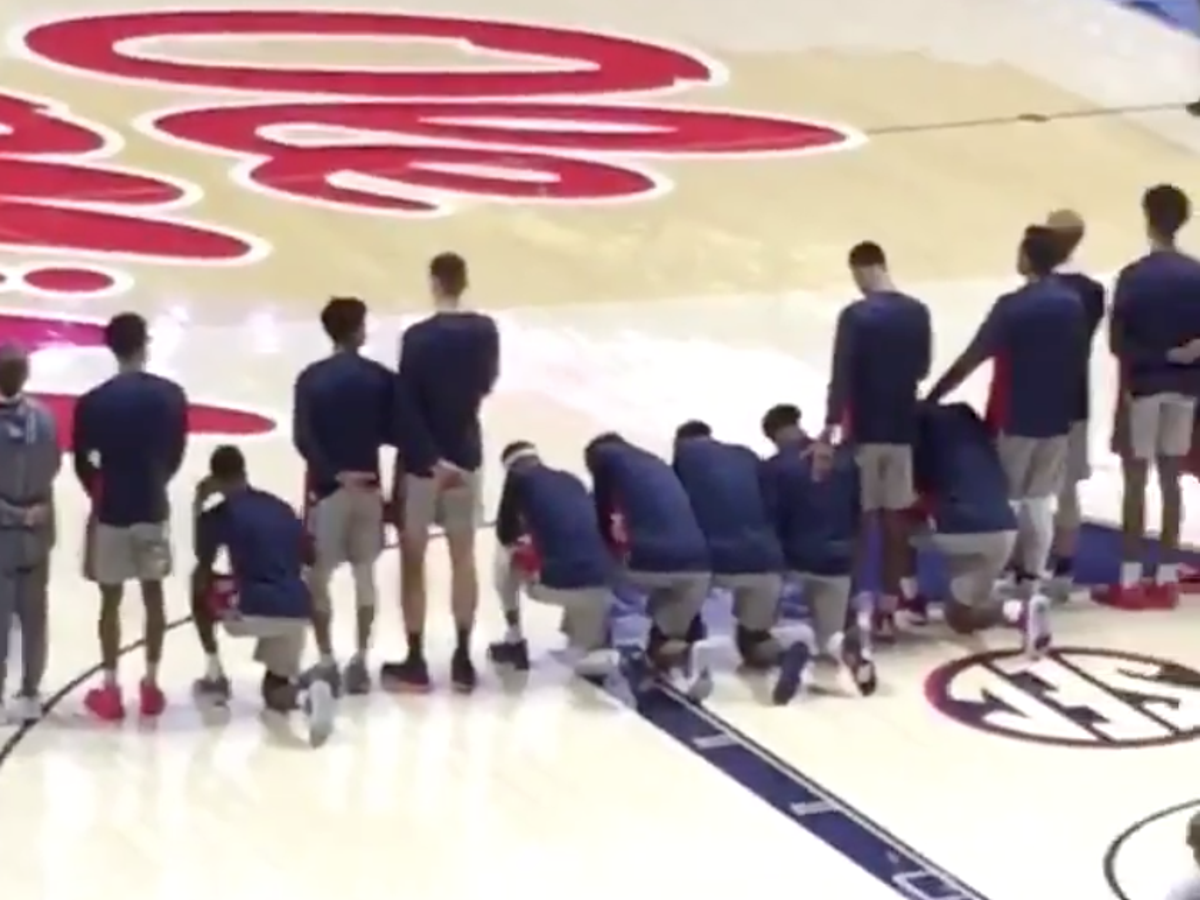 Ole Miss basketball players take a knee during national anthem as pro ...