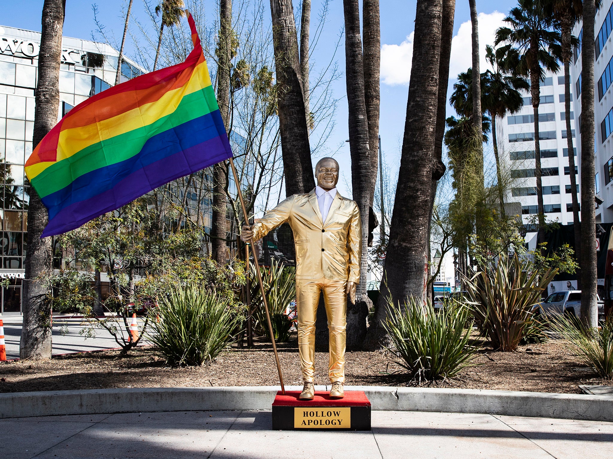 Kevin Hart statue holding LGBT+ pride flag appears near Oscars venue ...