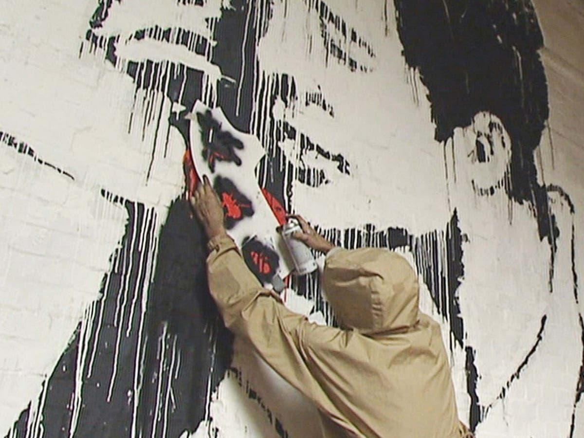 Banksy: Mysterious street artist revealed in behind-the-scenes photos ...