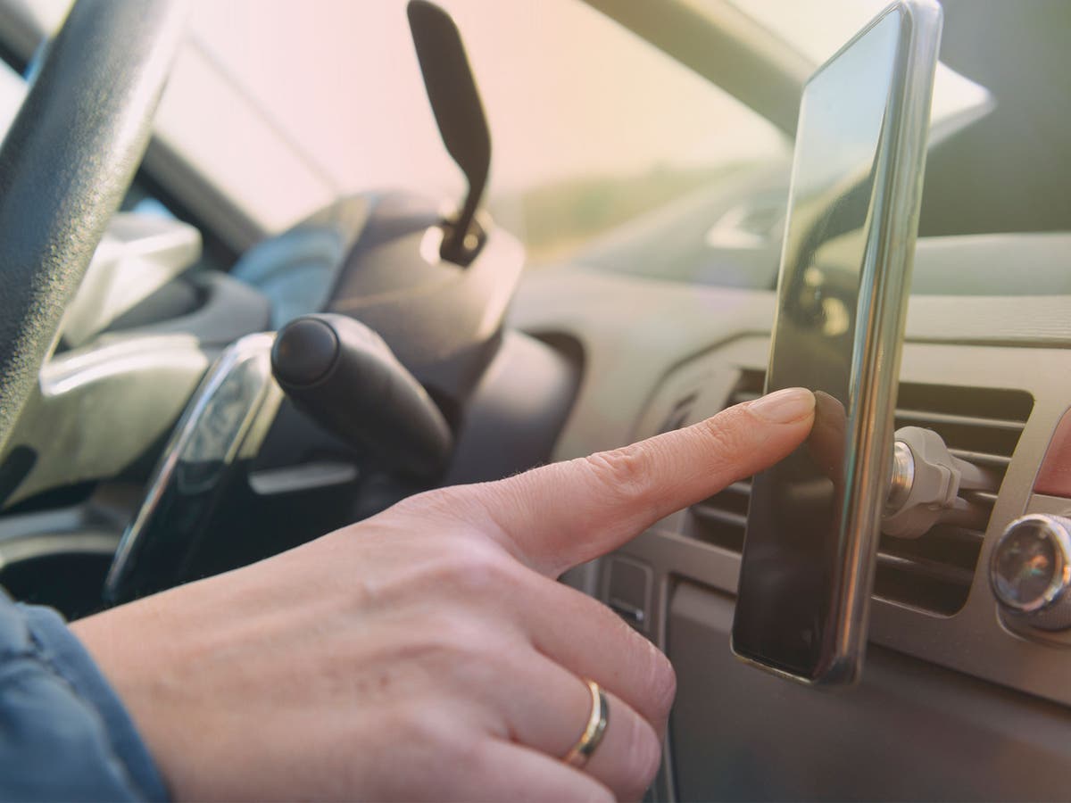 Ban drivers making hands-free phone calls, say MPs | The Independent ...
