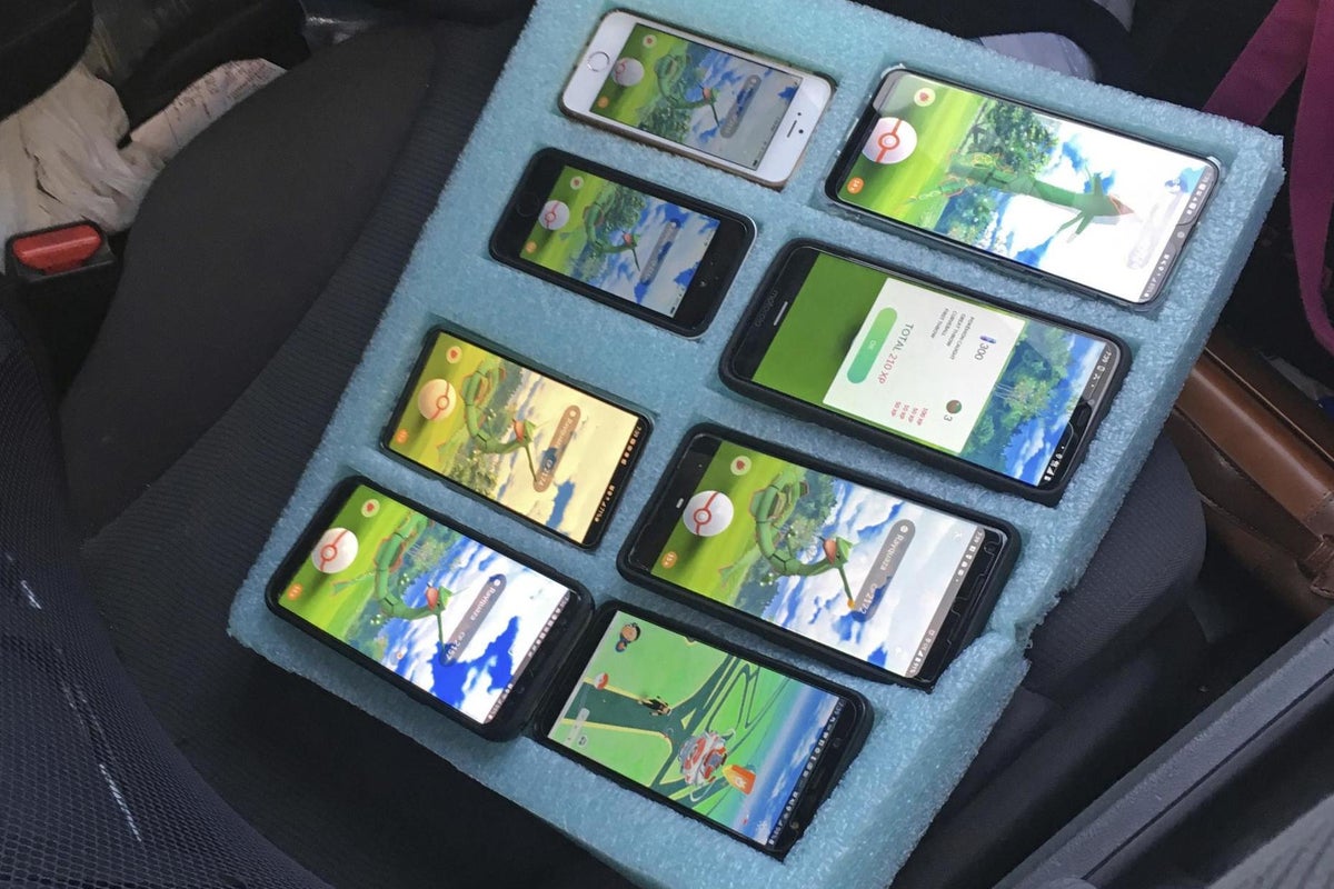 Pokemon Go superfan caught playing game on eight phones at once on ...