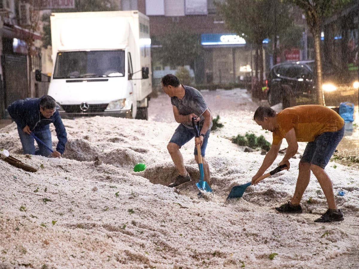 Madrid storm: Streets turn to rivers as flash-flooding, hailstones and ...