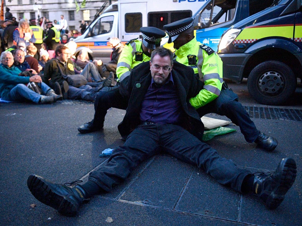 Extinction Rebellion protests: Activists defy police and glue ...