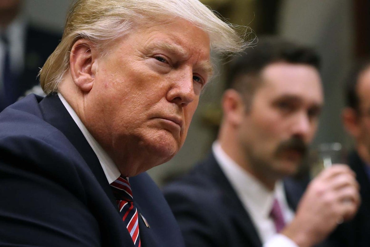 Trump complains about light bulbs making him look orange and people ...