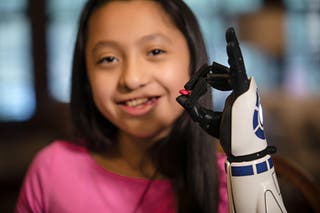 Eleven-year-old Star Wars fan gets R2-D2 bionic arm and shows it off to ...