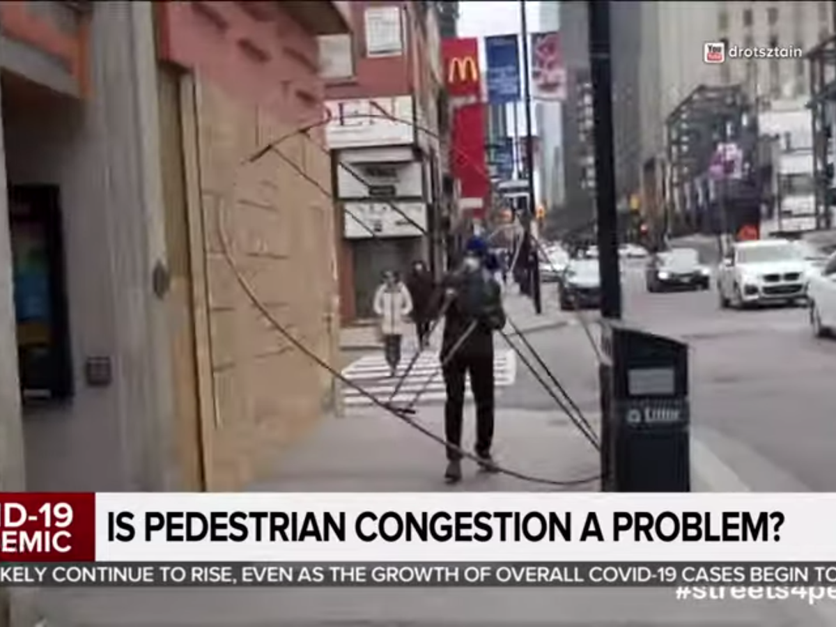 Artist wears coronavirus ‘social distancing machine’ on city streets to ...