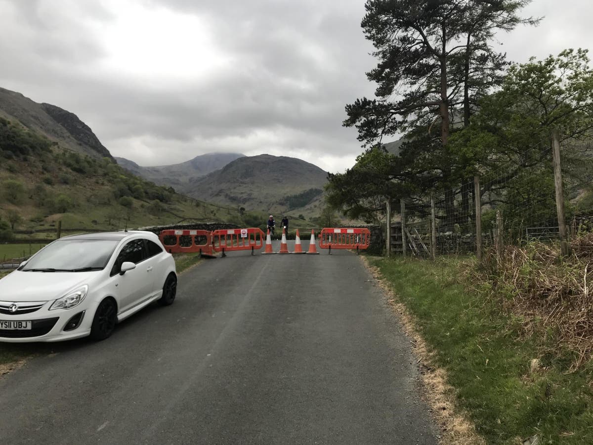 Angry Lake District residents erect roadblocks and fake signs to deter ...