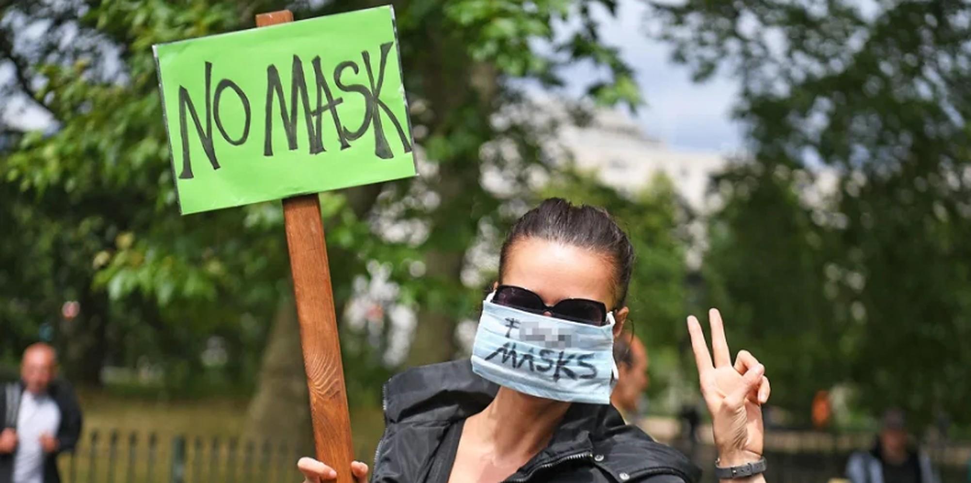 Anti Mask Protesters Branded Idiots For Protesting While Wearing