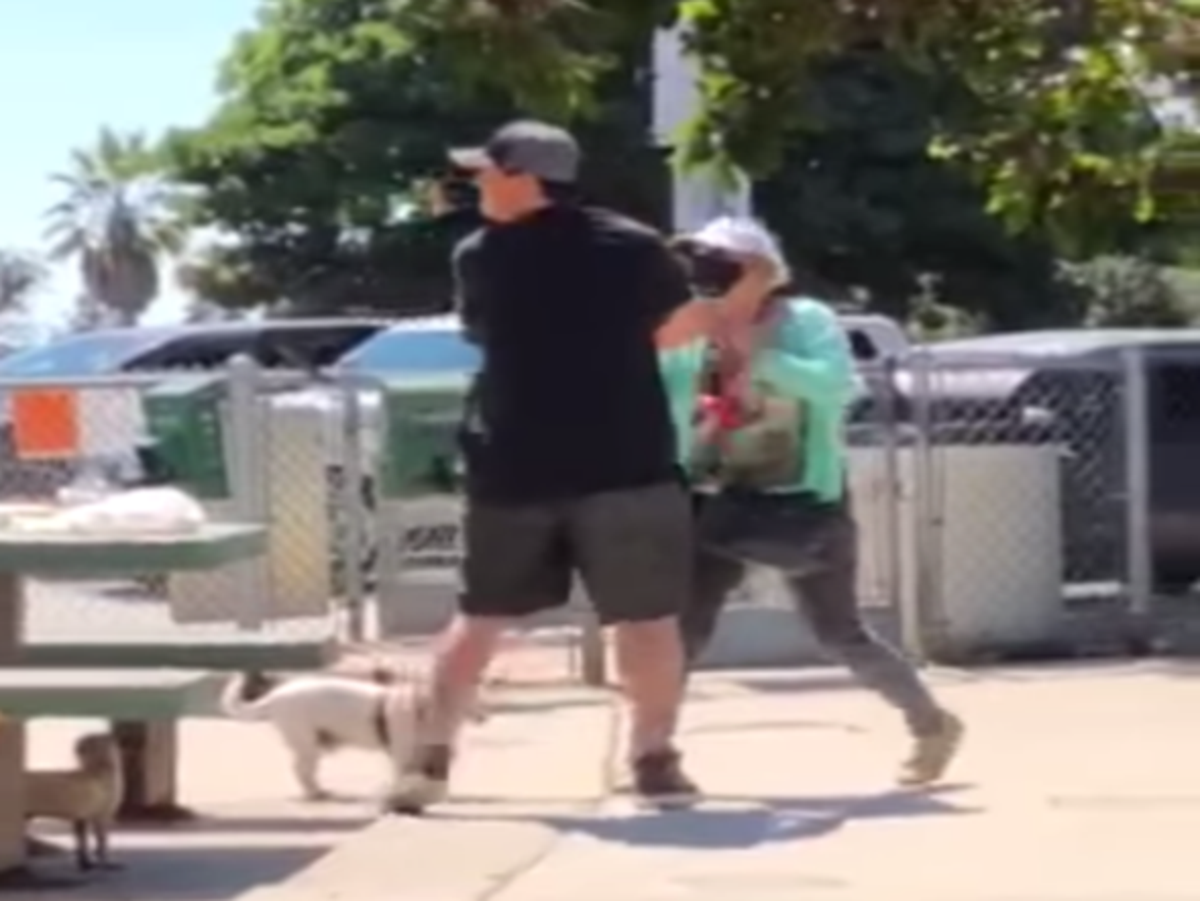 Woman caught on video macing couple for not wearing masks in park | The ...