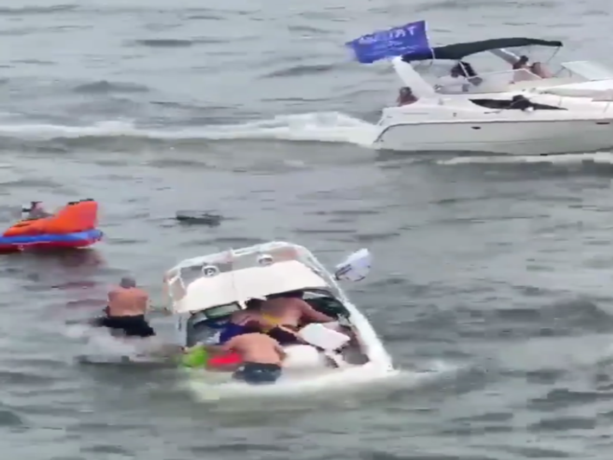 Boaters scream for help as vessel sinks after being swamped with water ...